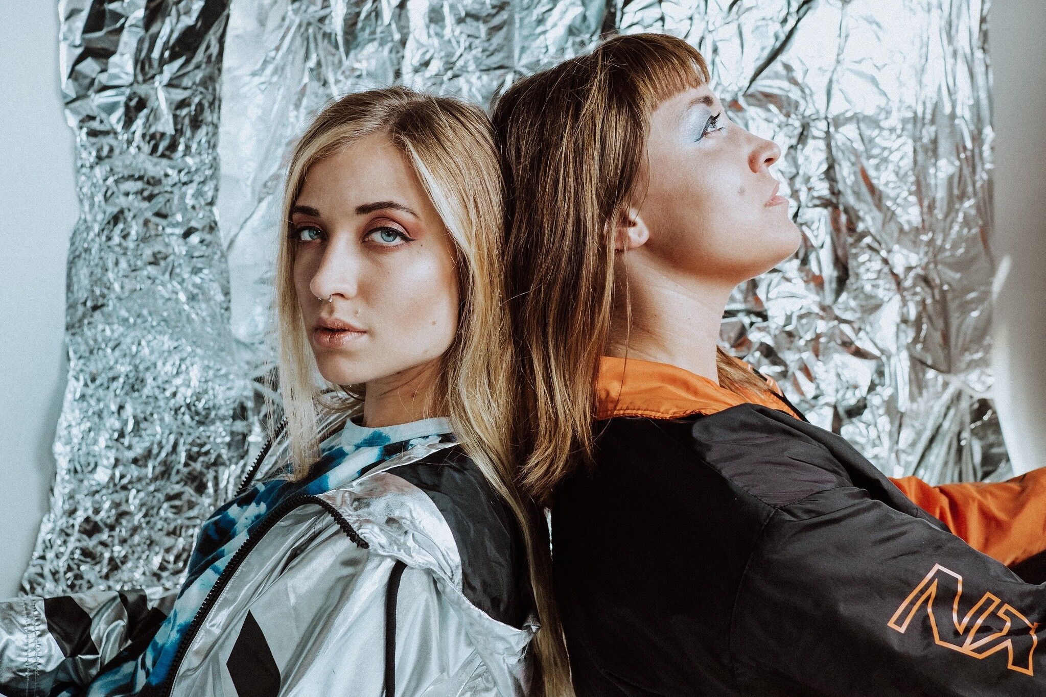 The Hottman Sisters ignite their past on glossy new track ‘Fire’